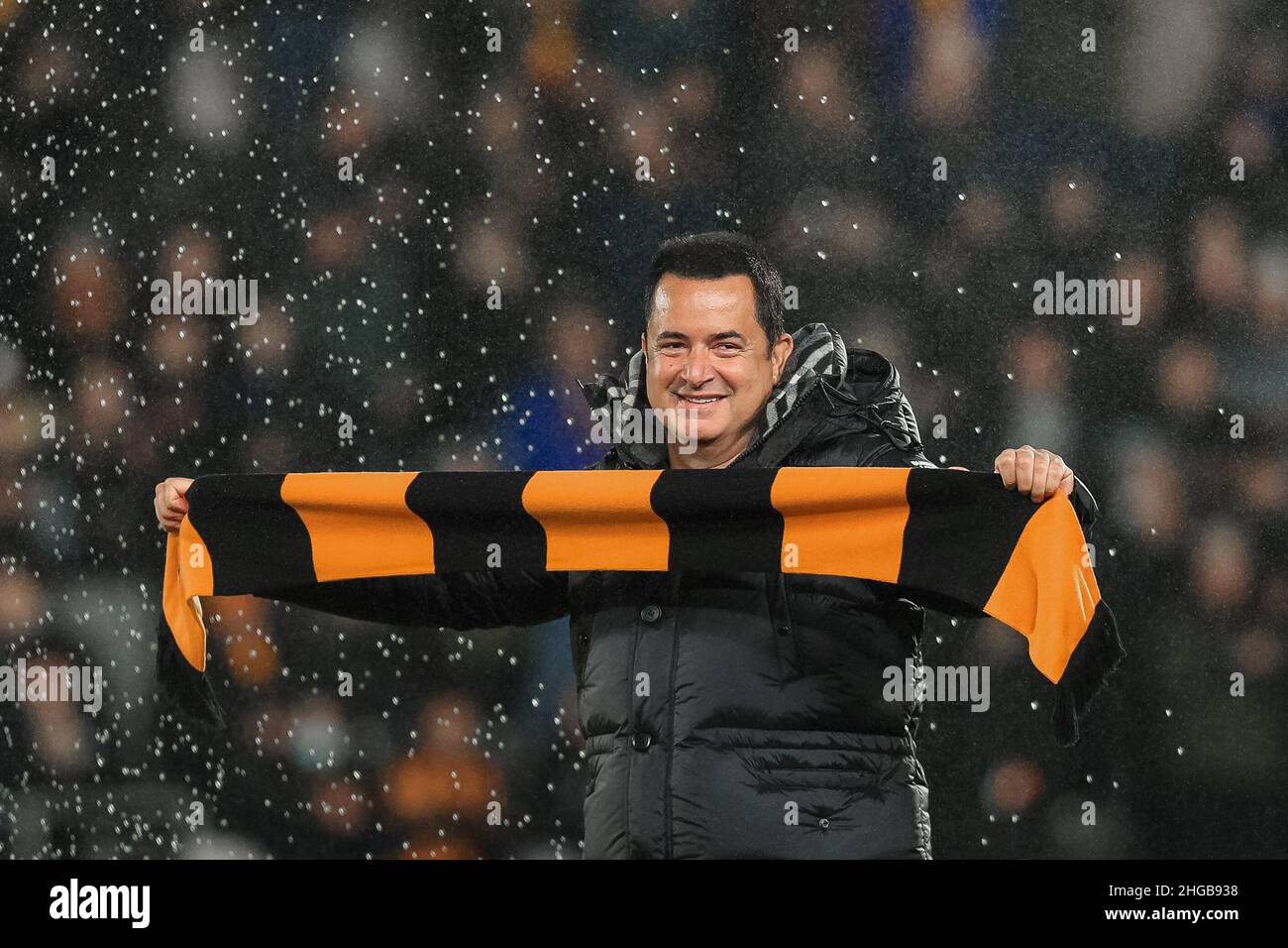 The new Hull City FC owner Acun Ilicali holds up his scarf as the fans ...