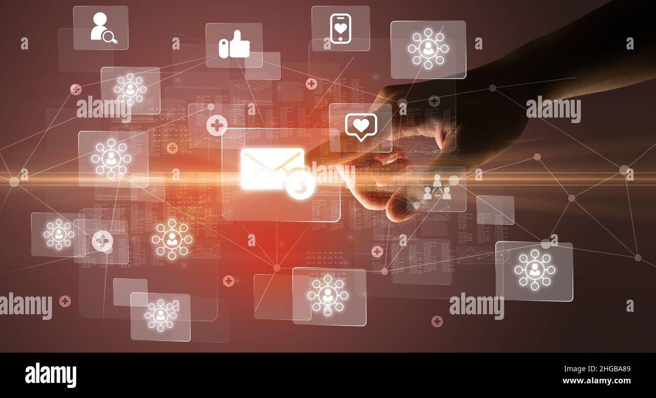 Hand pressing social media multimedia application screen with media ...