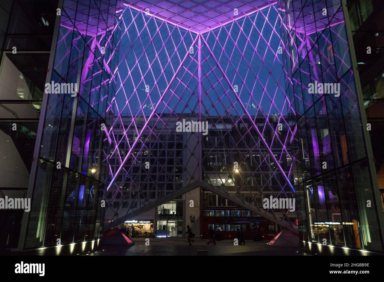 The atrium of 55 Baker Street, London, features purple lights between ...