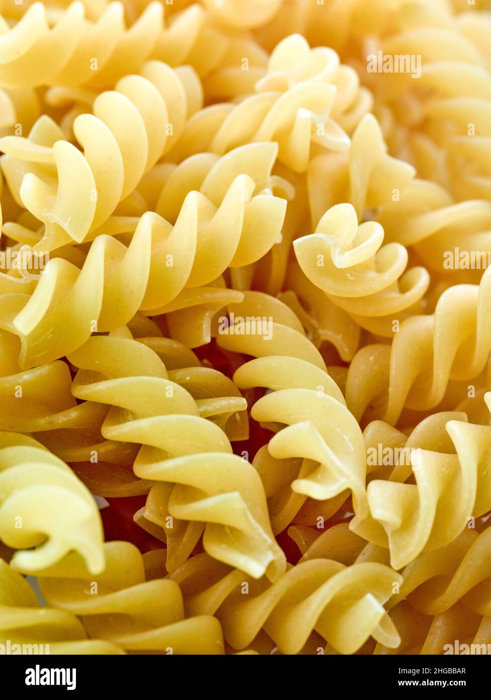 Macro food ingredient still life of Fusilli, fuˈzilli, pasta Stock ...