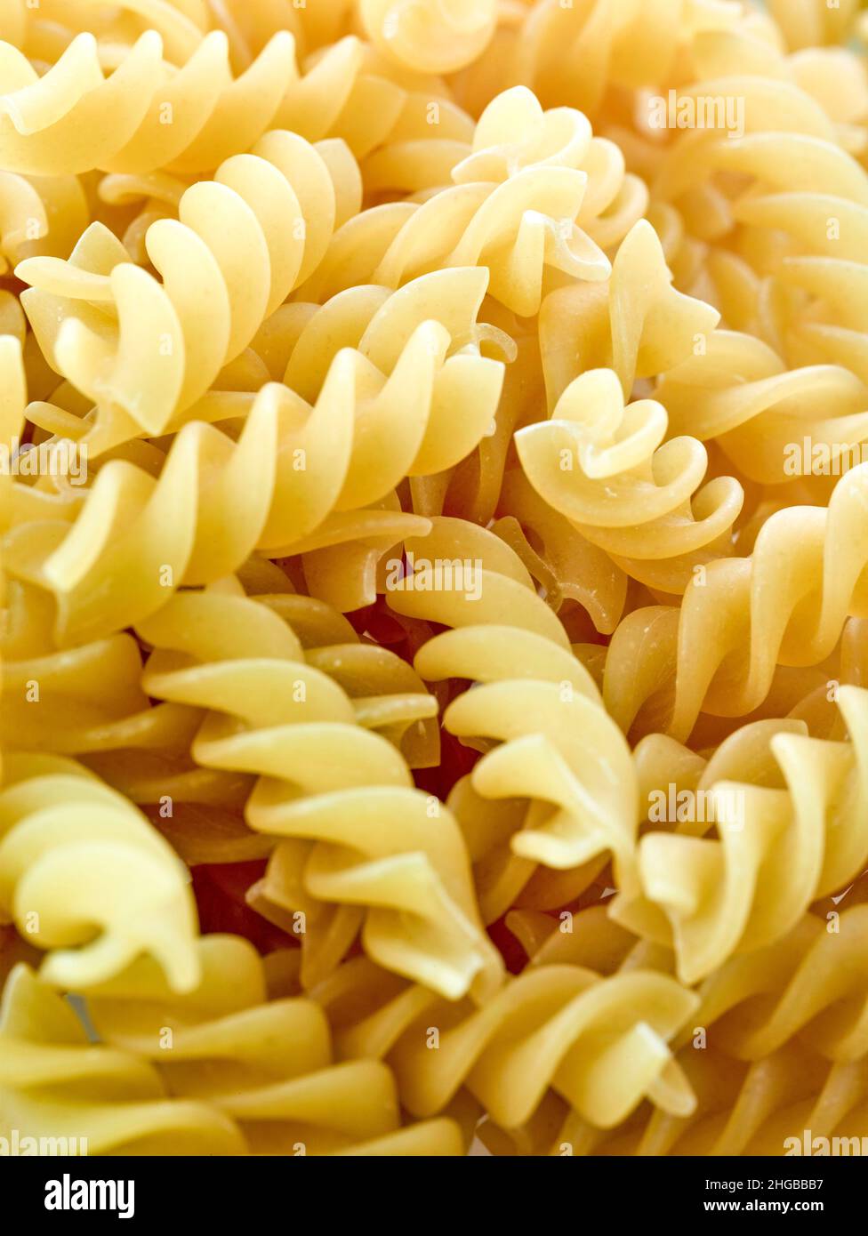 Macro food ingredient still life of Fusilli, fuˈzilli, pasta Stock ...