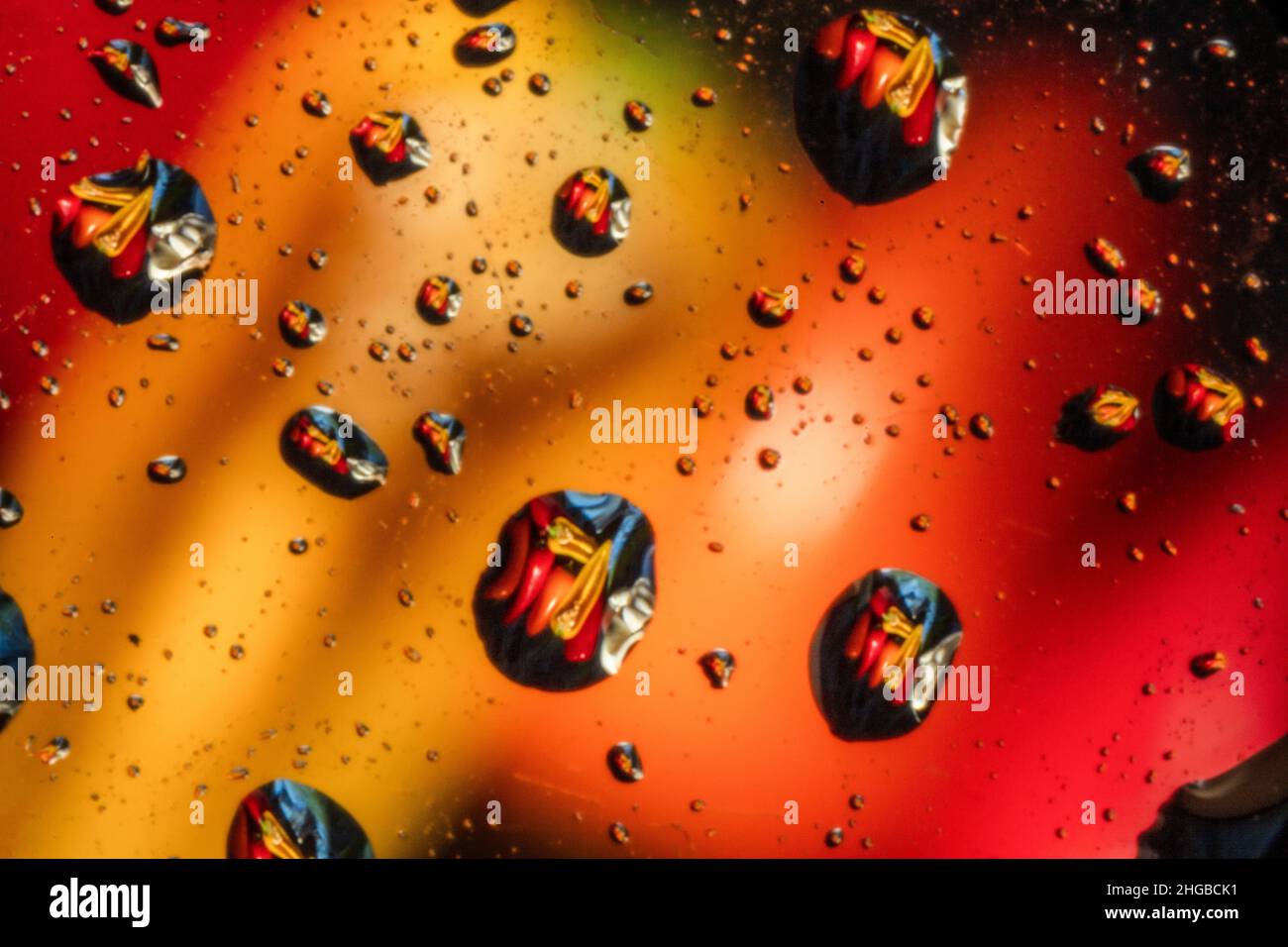 Creative food photography, high resolution fun sized peppers reflected ...