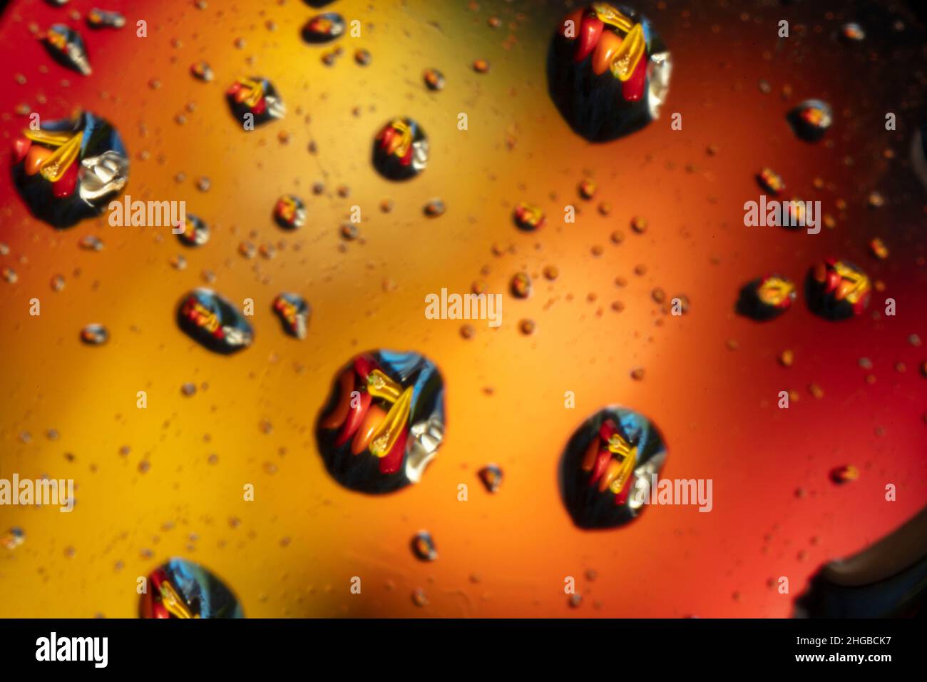 Creative food photography, high resolution fun sized peppers reflected ...