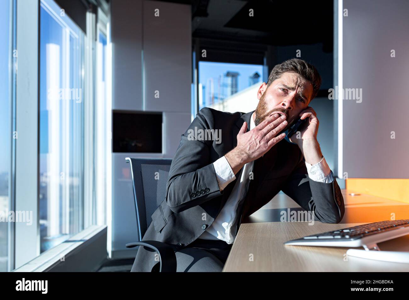Bored businessman hi-res stock photography and images - Alamy
