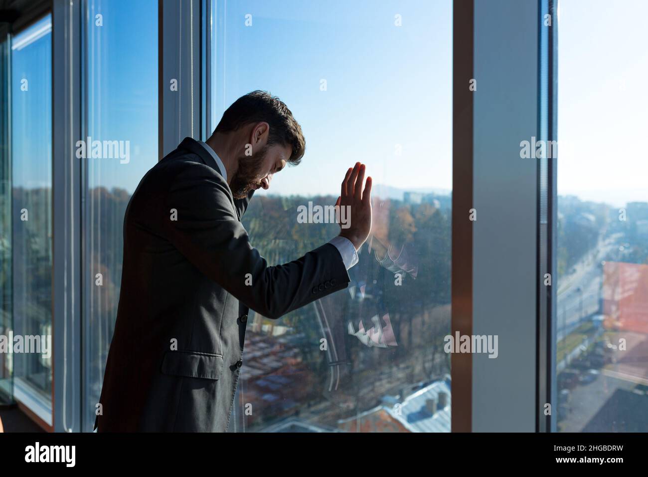 Bankrupt businessman boss, frustrated looking out the window, man in ...