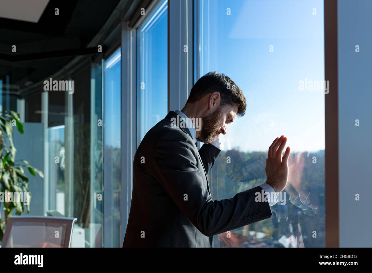 Bankrupt businessman boss, frustrated looking out the window, man in ...