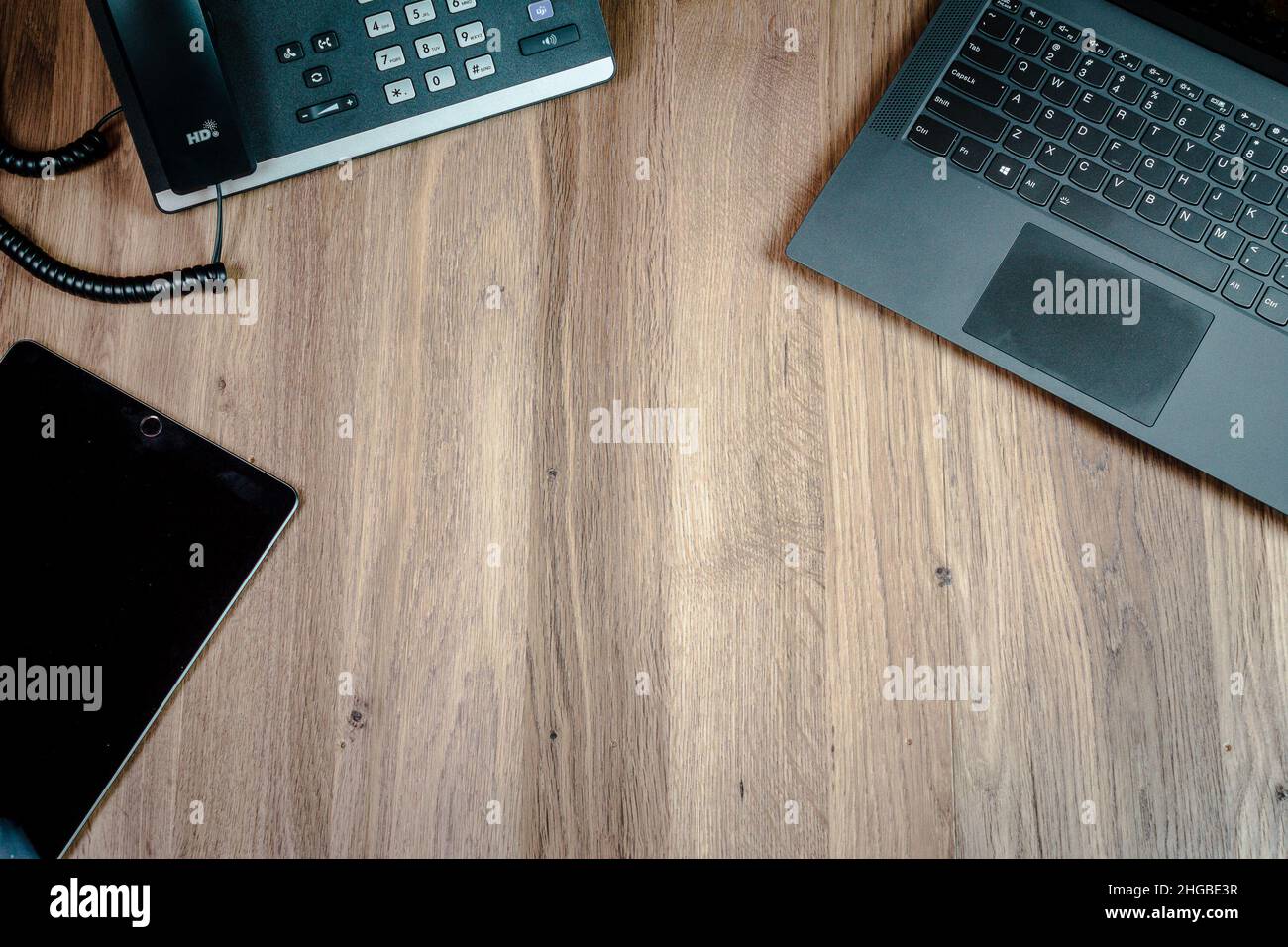 Top down view of a home office desk showing a laptop and phone Stock ...