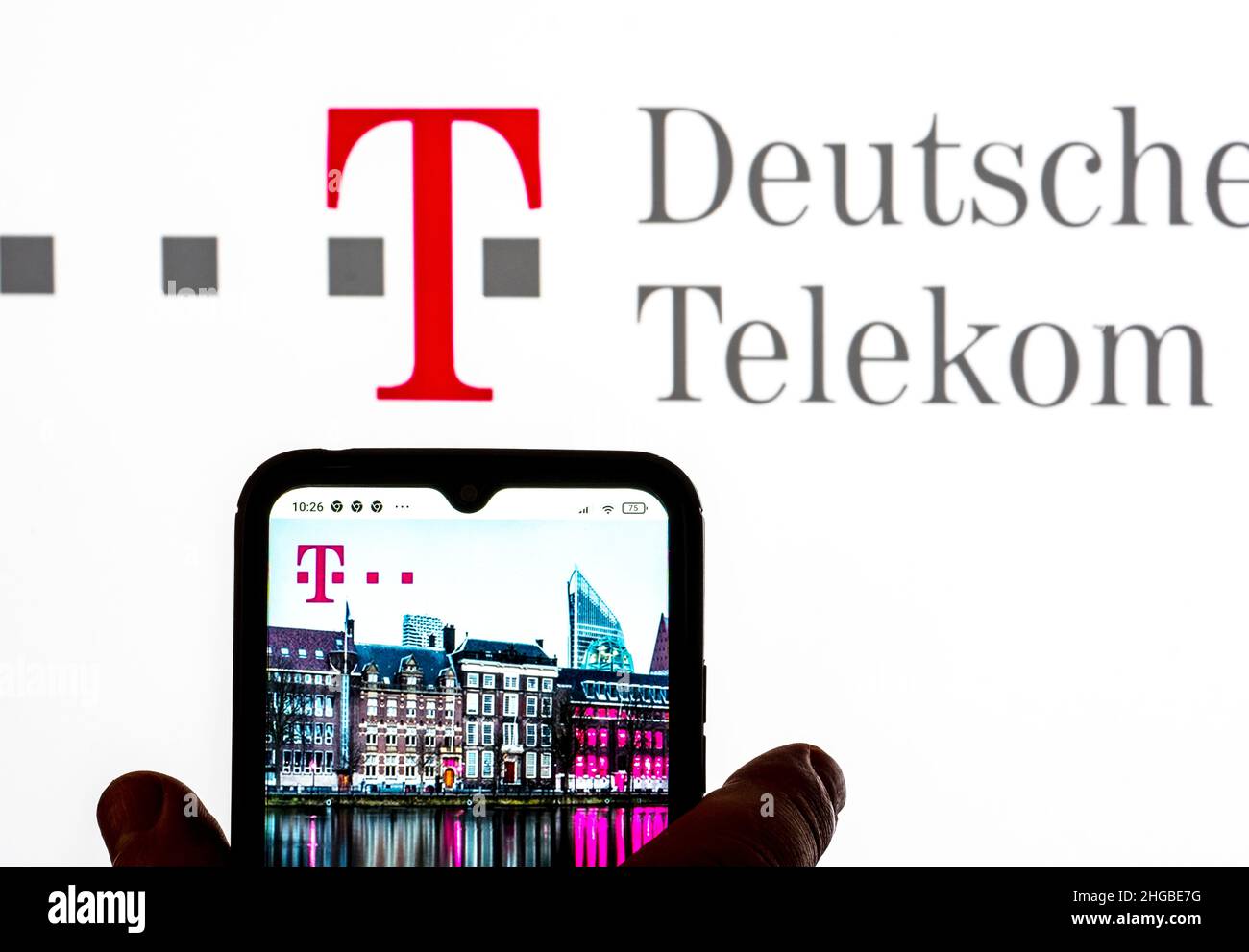 In this photo illustration, the T-Mobile Netherlands Holding B.V. logo ...
