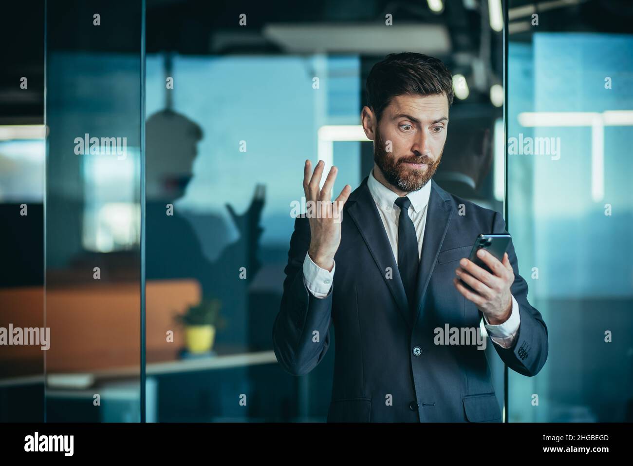 Angry and nervous boss shouting into phone, during phone conversation ...