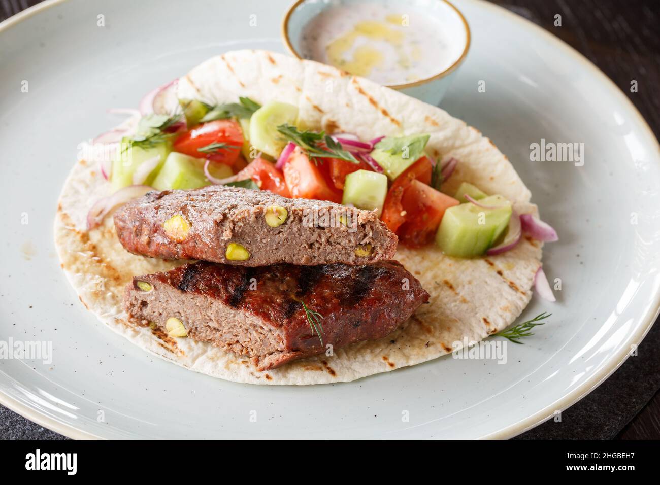 Fried lula kebab of minced beef with pistachios Stock Photo - Alamy