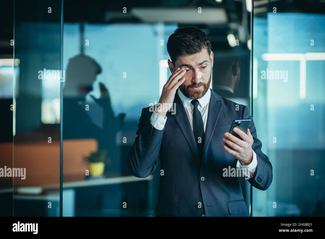 Angry and nervous boss shouting into phone, during phone conversation ...