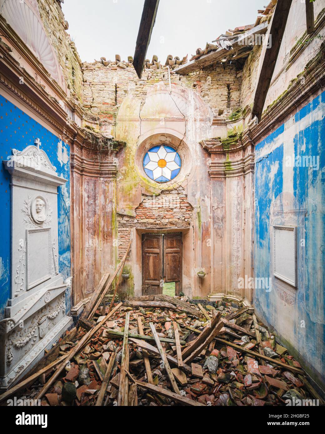 Decaying interior of an abandoned building with peeling paint and ...