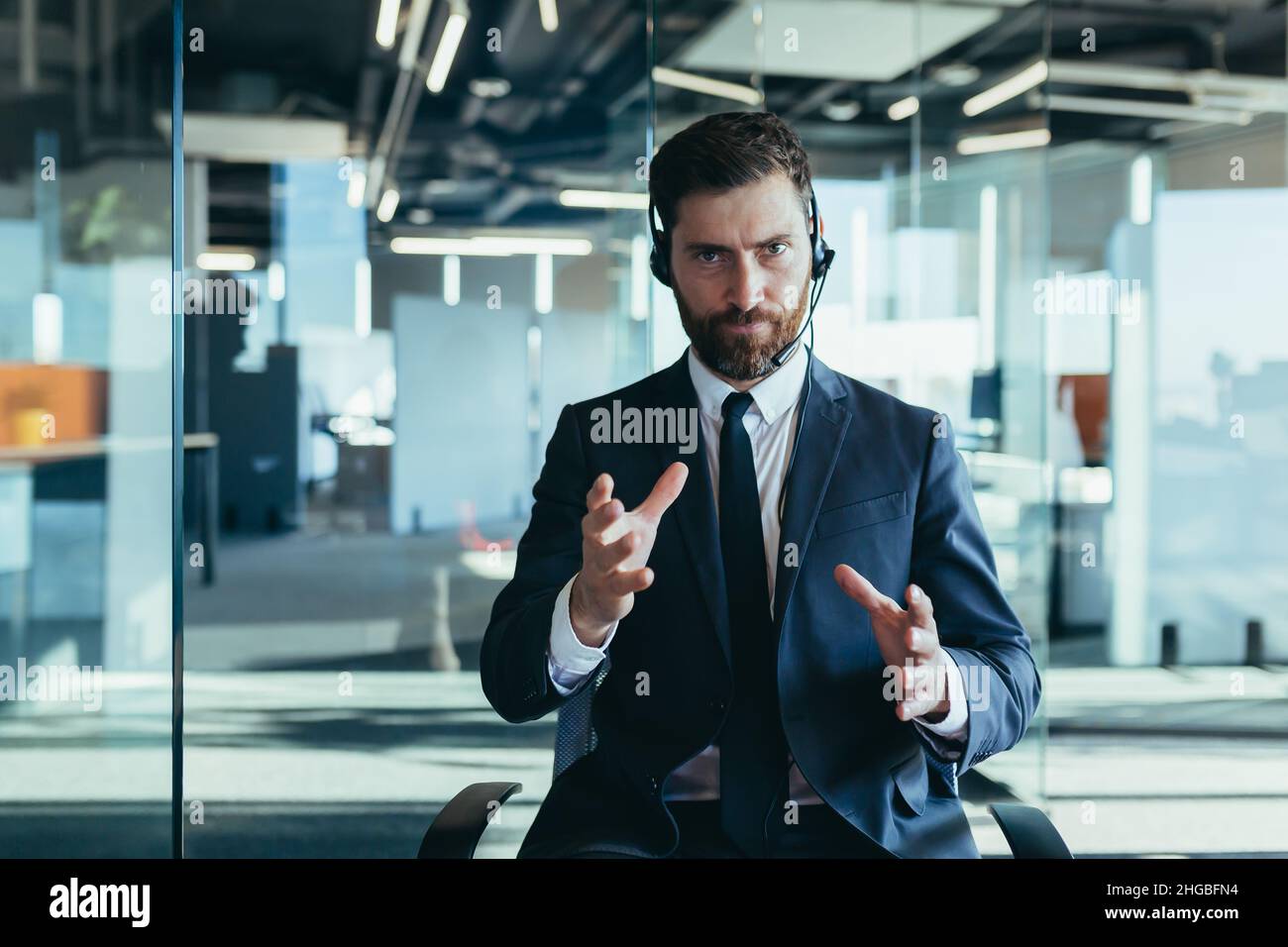 The employee makes a video call, looks at the camera and explains the ...