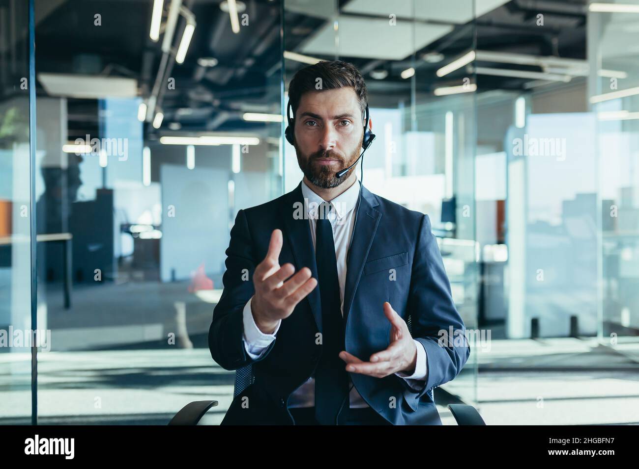 The employee makes a video call, looks at the camera and explains the ...