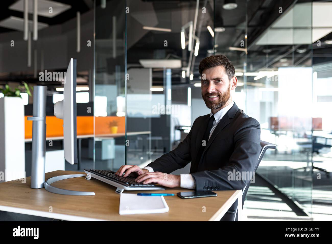 Successful businesswoman looking at camera and smiling happy boss ...