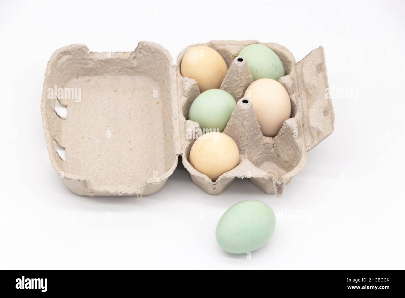 cardboard box of 6 colourful free range farm eggs blue green and brown ...