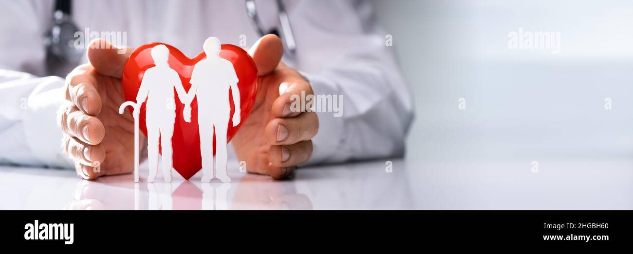 Health And Life Insurance. Heart Protected By Doctor Stock Photo - Alamy
