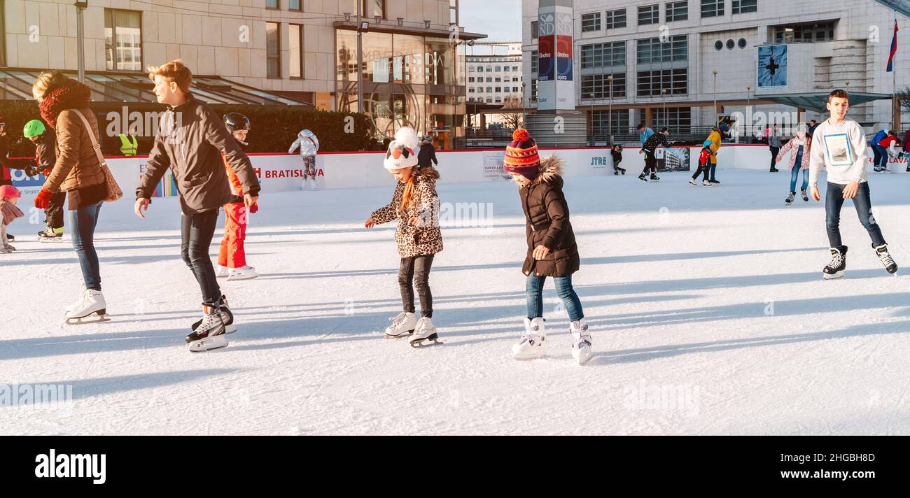 Slovakia.Bratislava.28.12.2018 .Soft,Selective focus.People ice skating ...