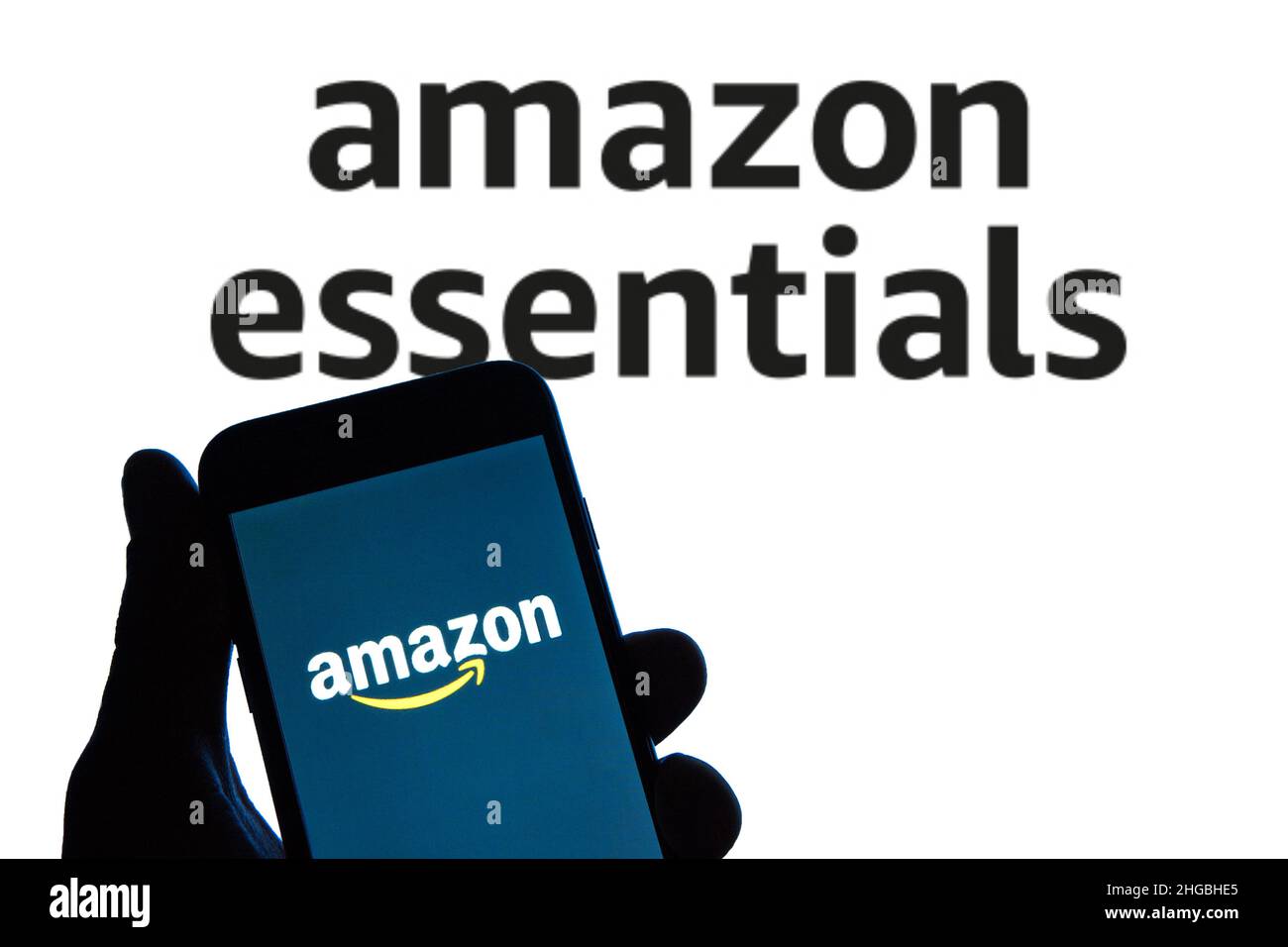 In this photo illustration an Amazon logo seen displayed on a ...