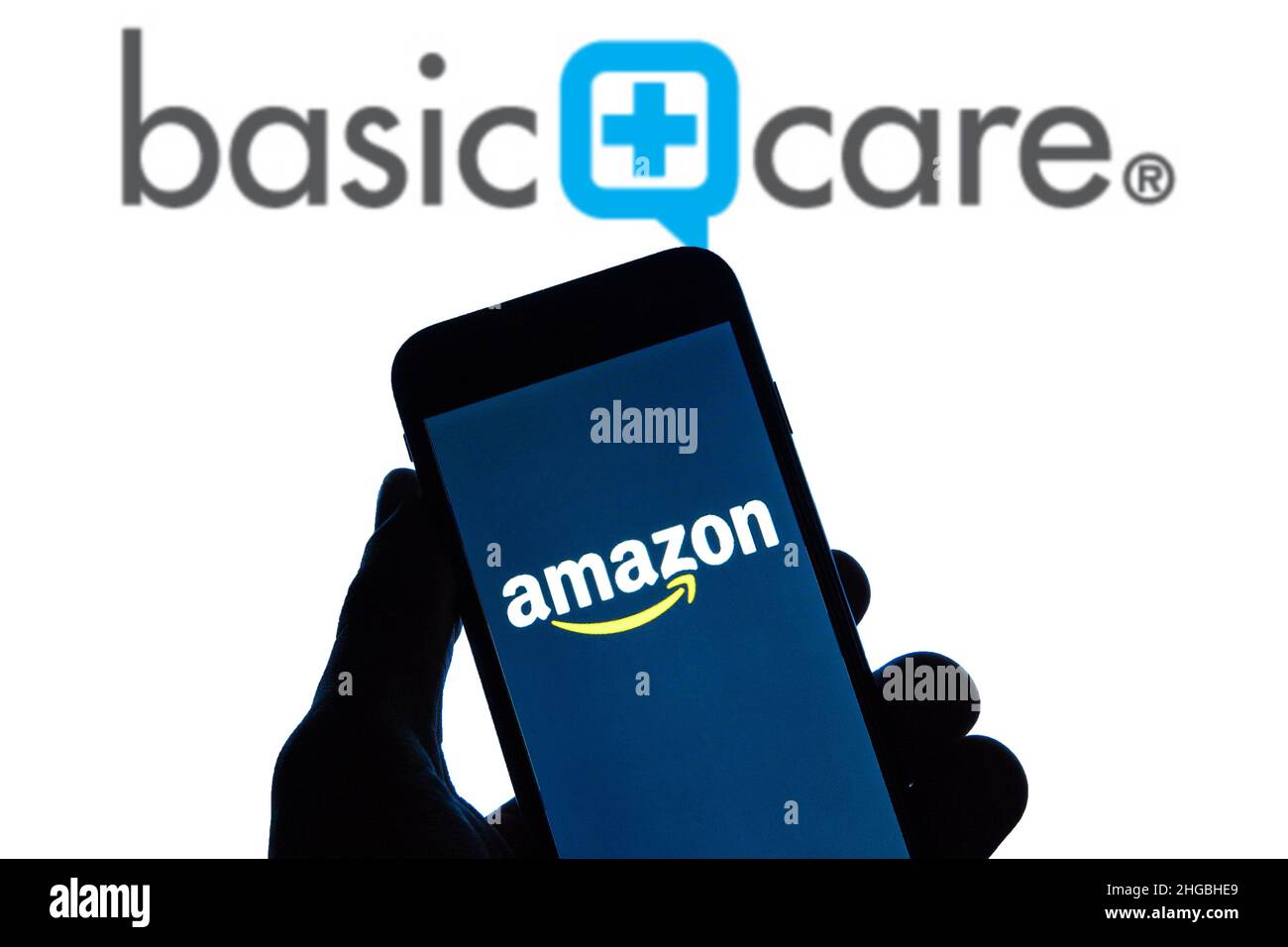 In this photo illustration an Amazon logo seen displayed on a ...