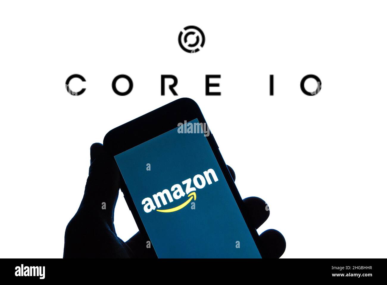 In this photo illustration an Amazon logo seen displayed on a ...