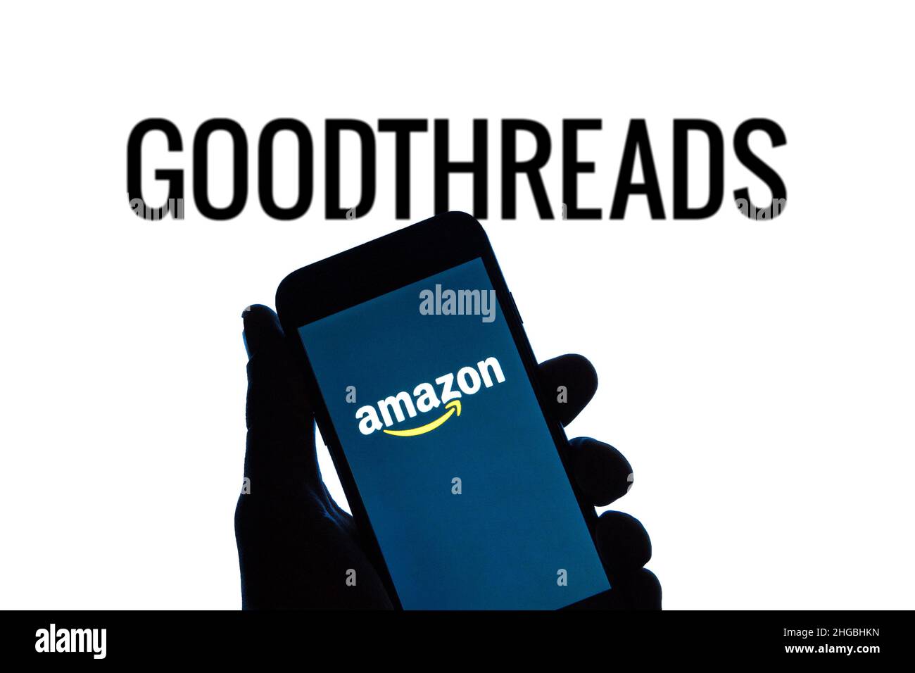 In this photo illustration an Amazon logo seen displayed on a ...