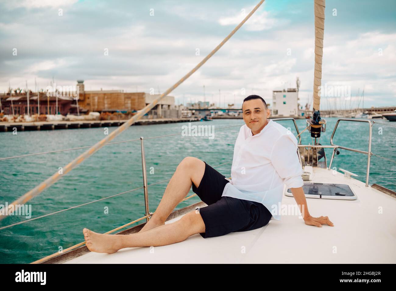 Stylish businessman on yacht boat hi-res stock photography and images ...
