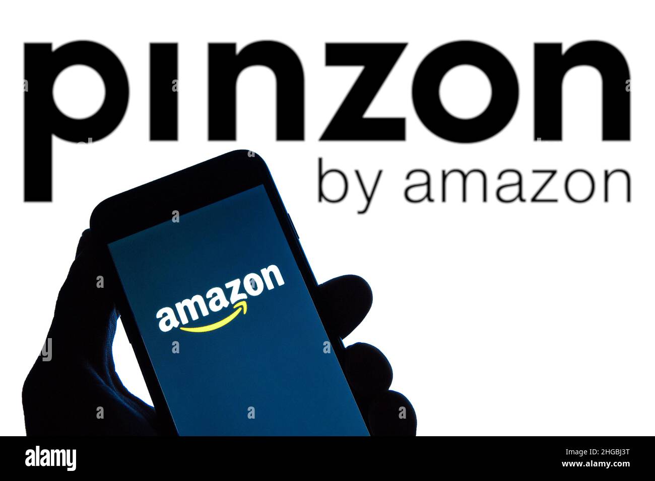 Spain. 12th Jan, 2022. In this photo illustration an Amazon logo seen ...