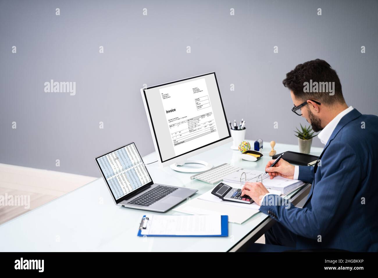 Business Invoice Tax Management. Accountant Using Monitor Stock Photo ...
