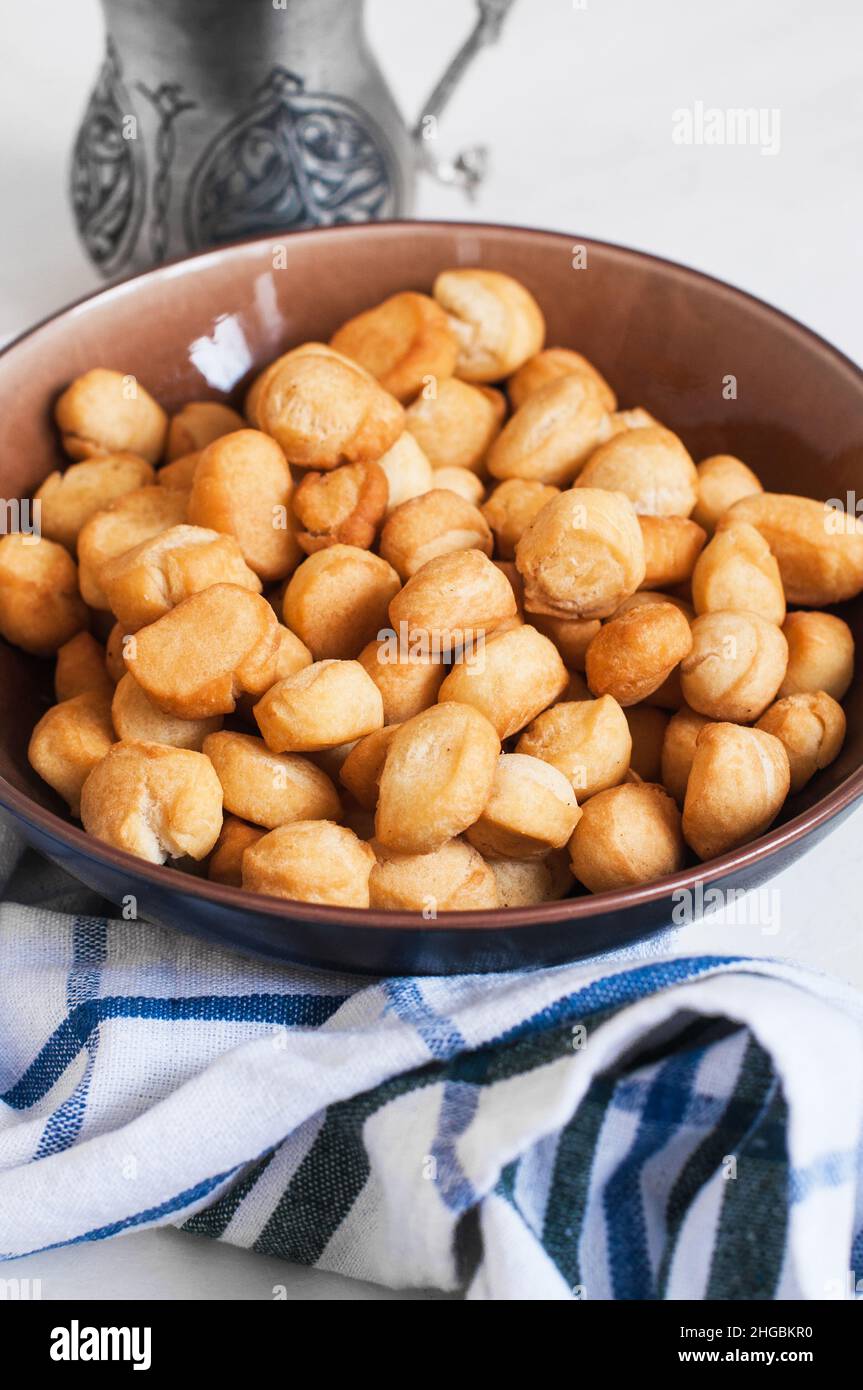 Shi - baursak, Kazakh national festive baking, small fried doughnuts in ...