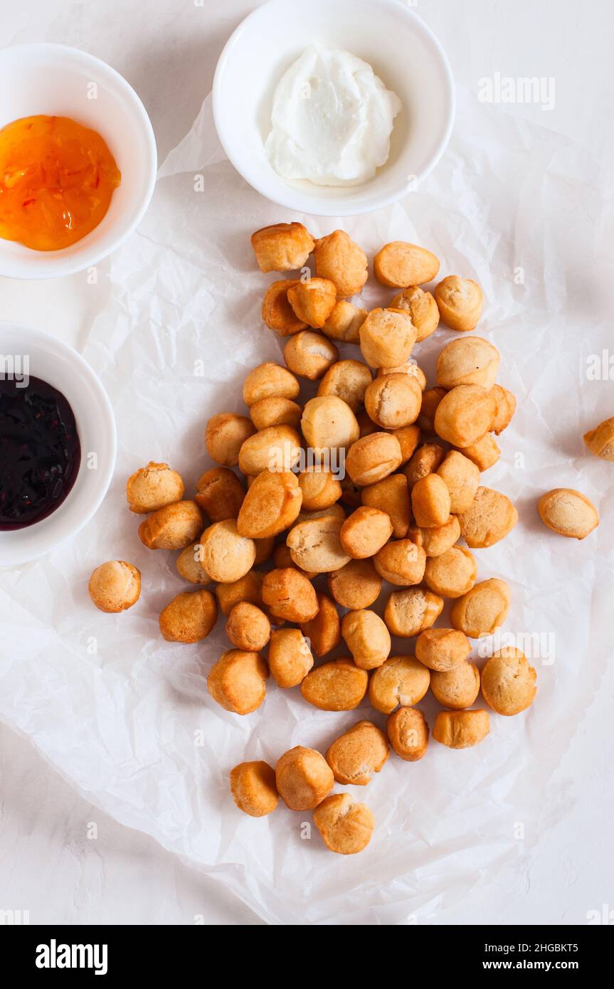 Shi-baursak, Kazakh traditional fried dounuts served on a parchment ...