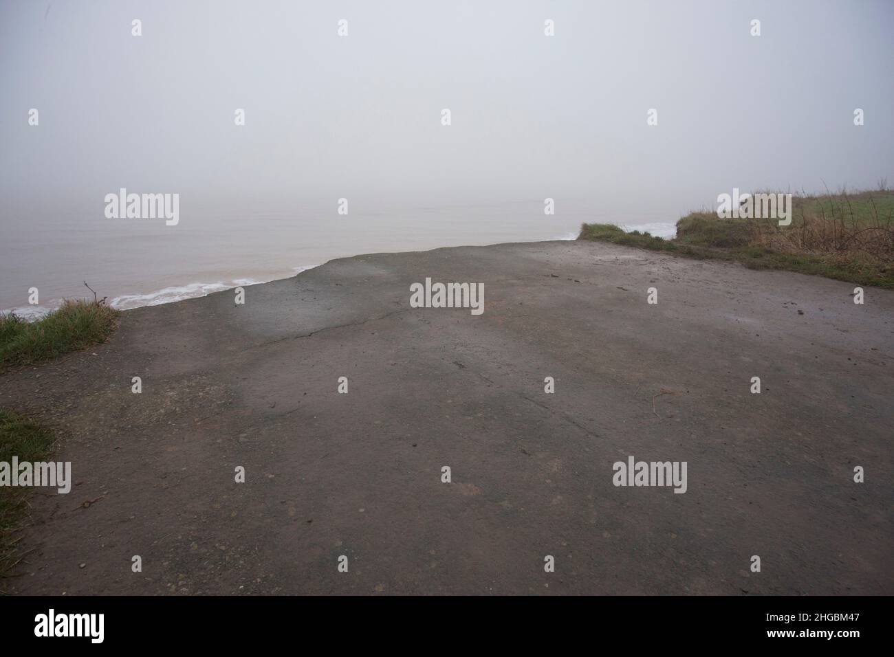End of the road Coastal erosion road closed where falls off cliff East ...