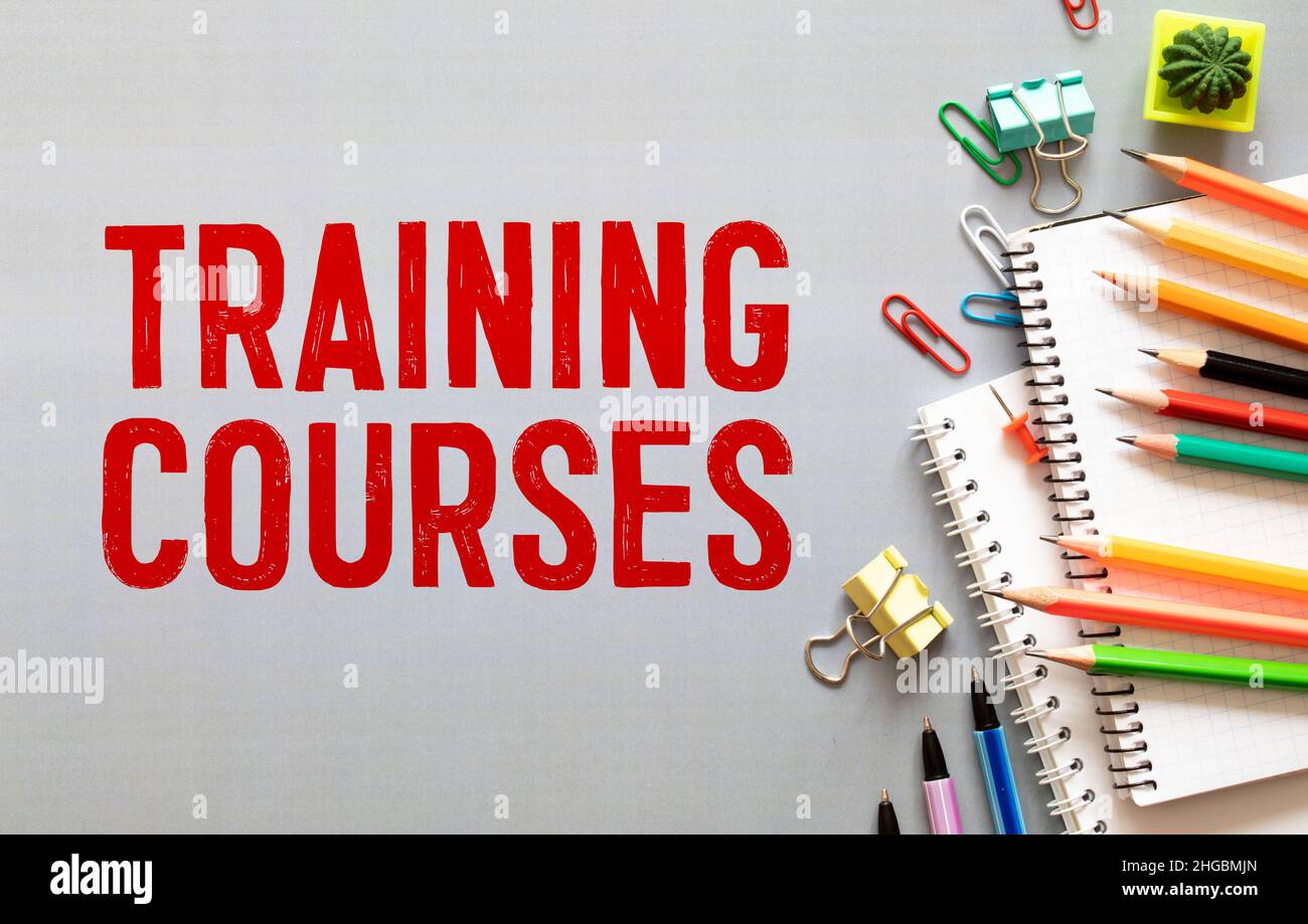 Training text on a wooden background Stock Photo - Alamy