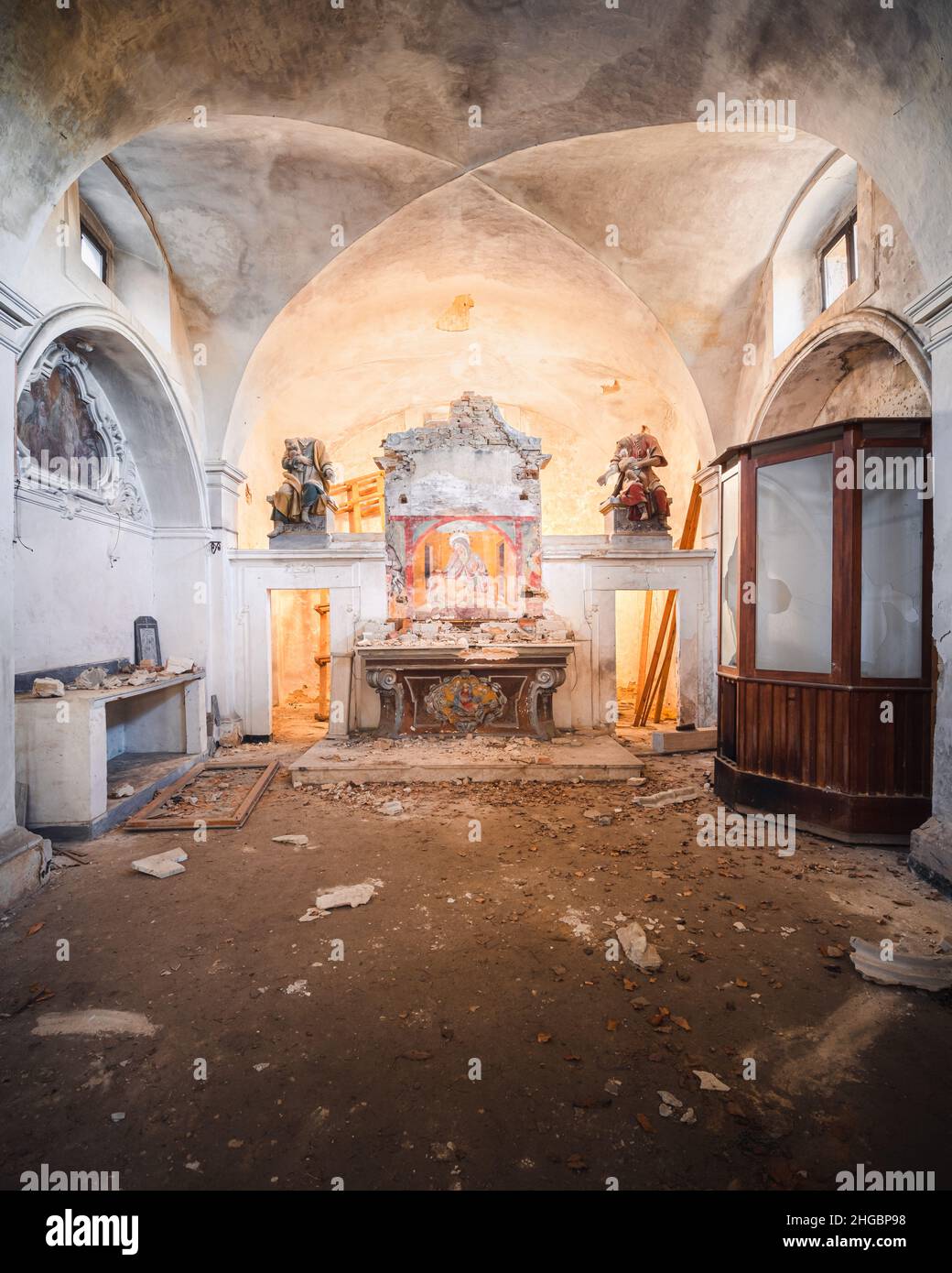 Decaying interior of an abandoned building with peeling paint and ...