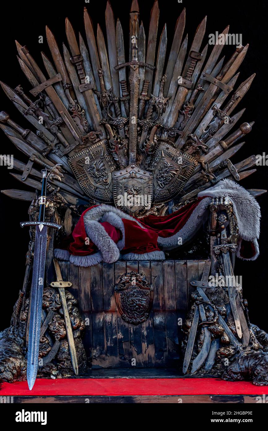 photography set of a throne with swords, shields and royal mantle ...