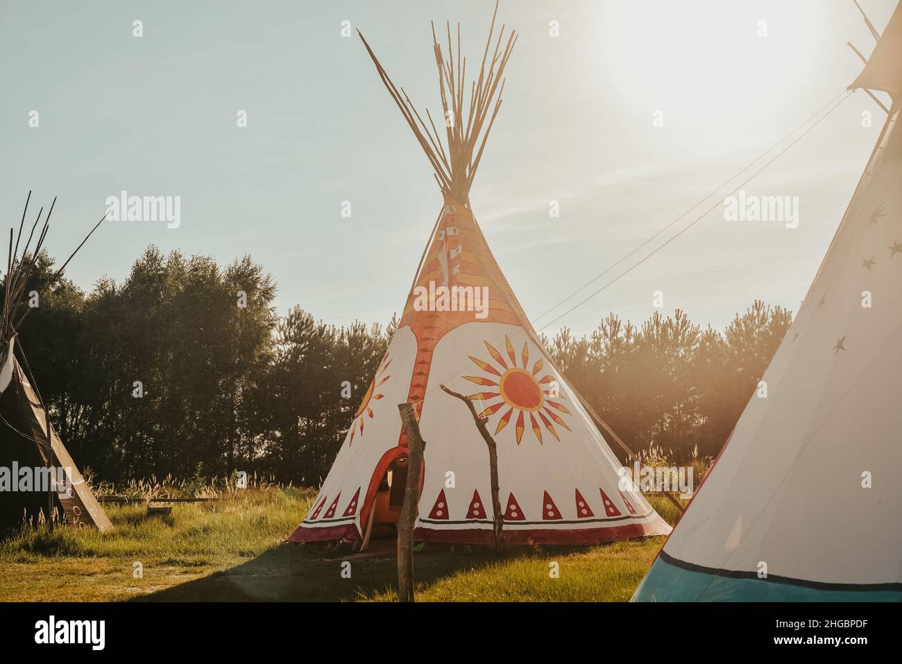 Tipi house in the forest against the background of trees, camping ...