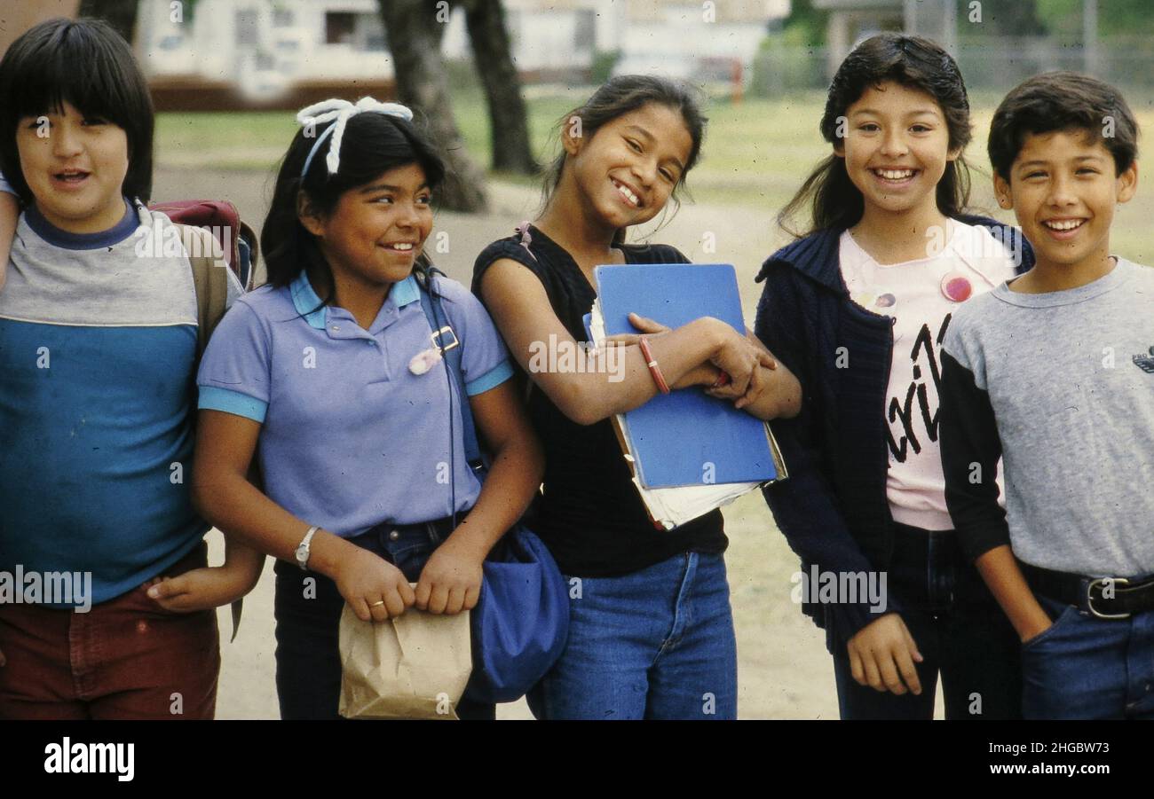 San Antonio, Texas 1990: Hispanic school children pose at their school ...