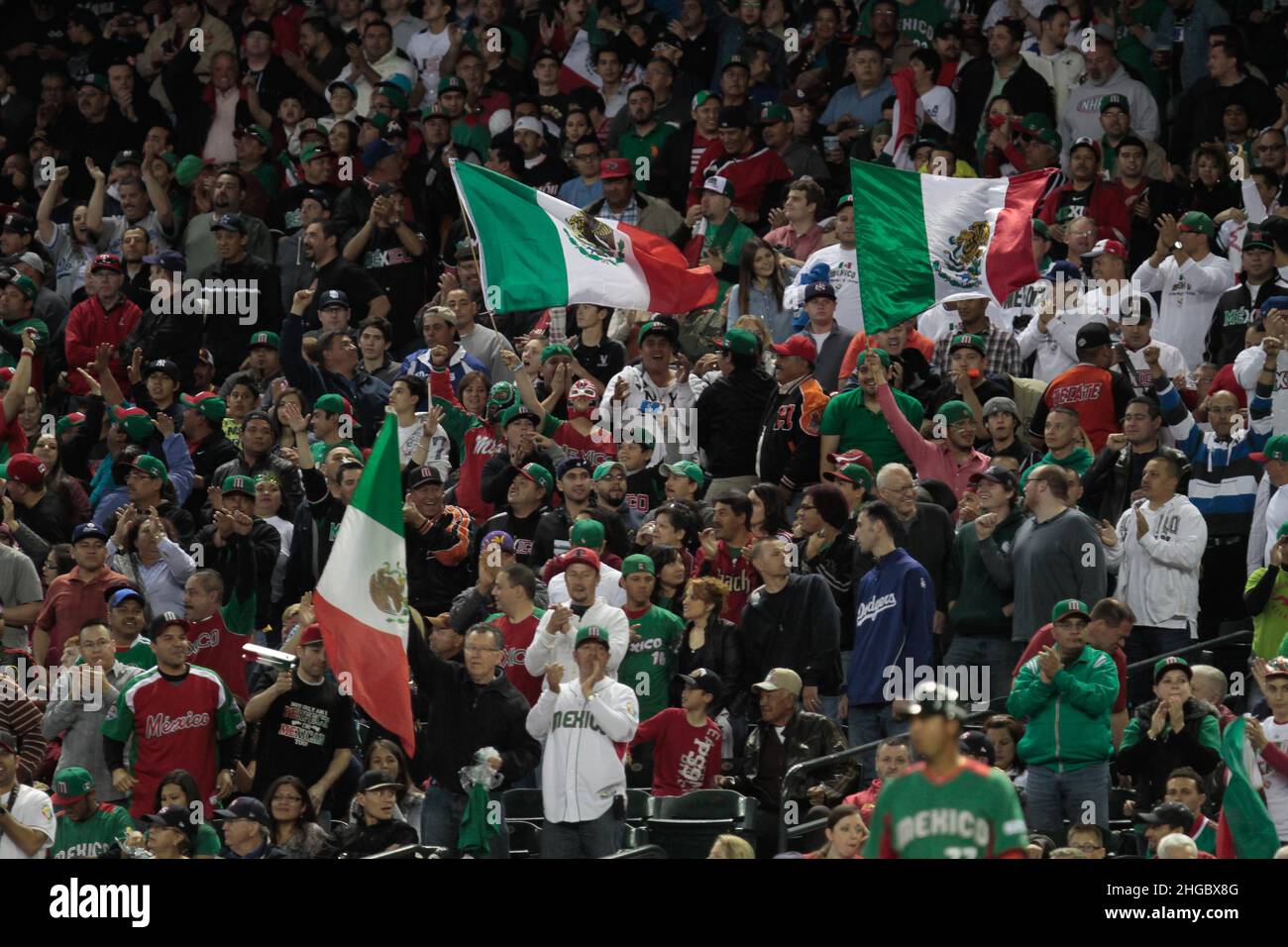 Mexican fans with Mexican flags in the stands, aficionados mexicanos ...