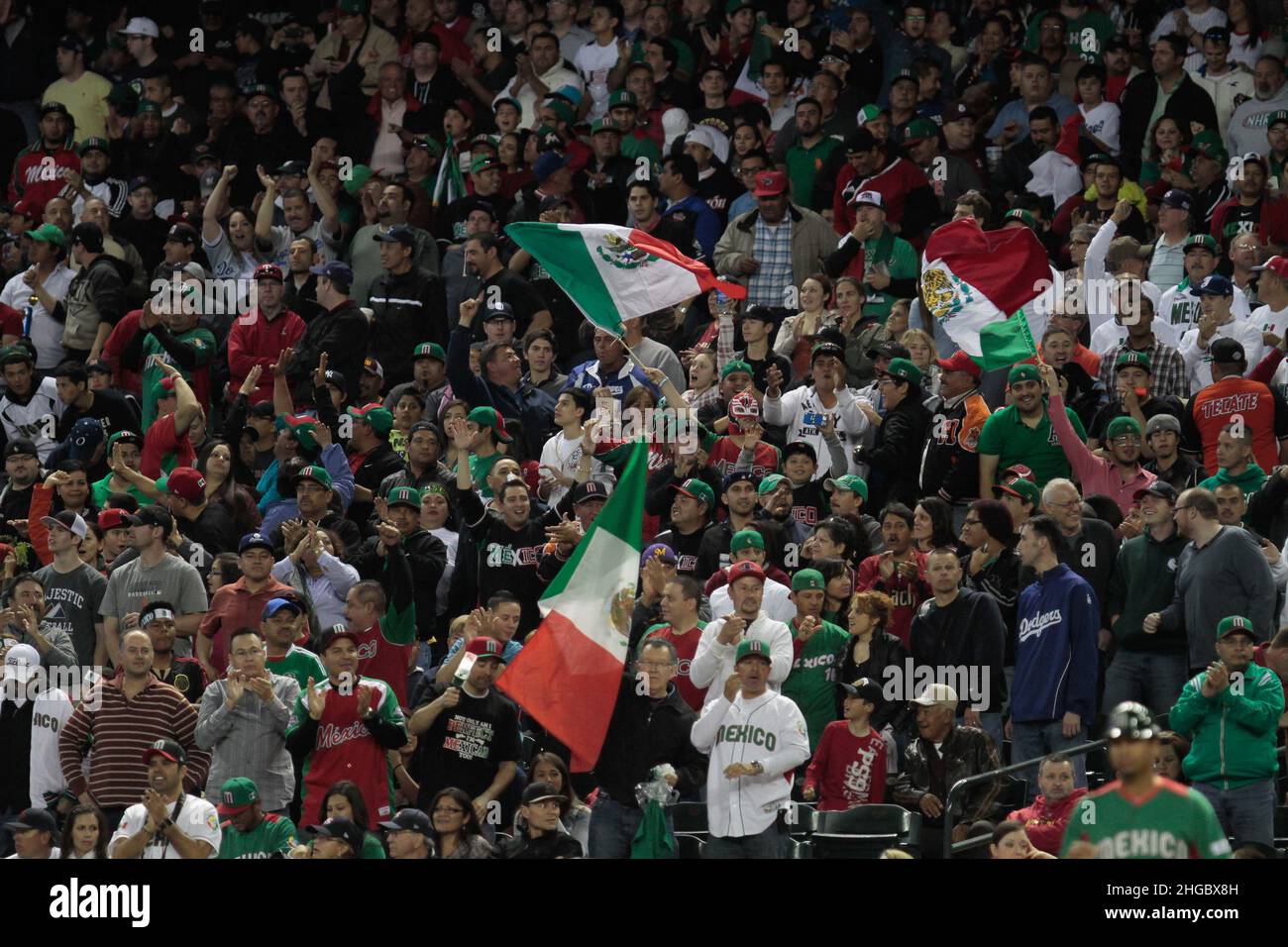 Mexican fans with Mexican flags in the stands, aficionados mexicanos ...