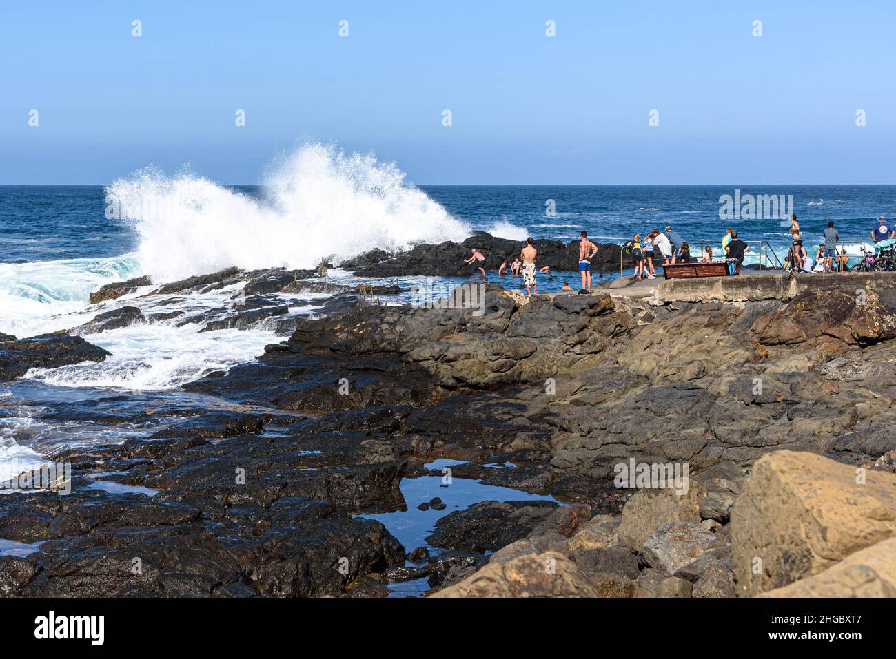 People swimming and playing in the Blowhole Point Ocean Pool in Kiama ...