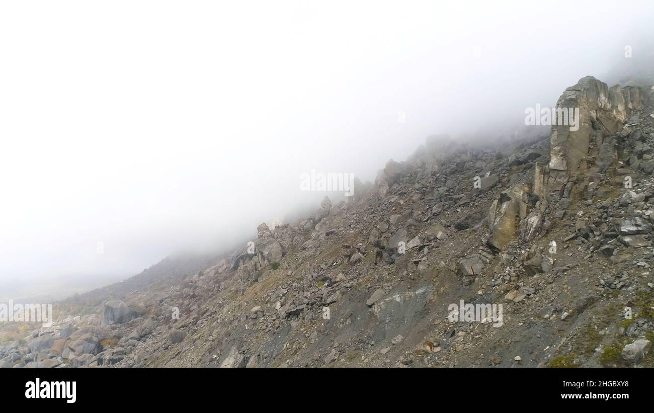 Majestical mountains in thick clouds. Landscape with beautiful rocks ...