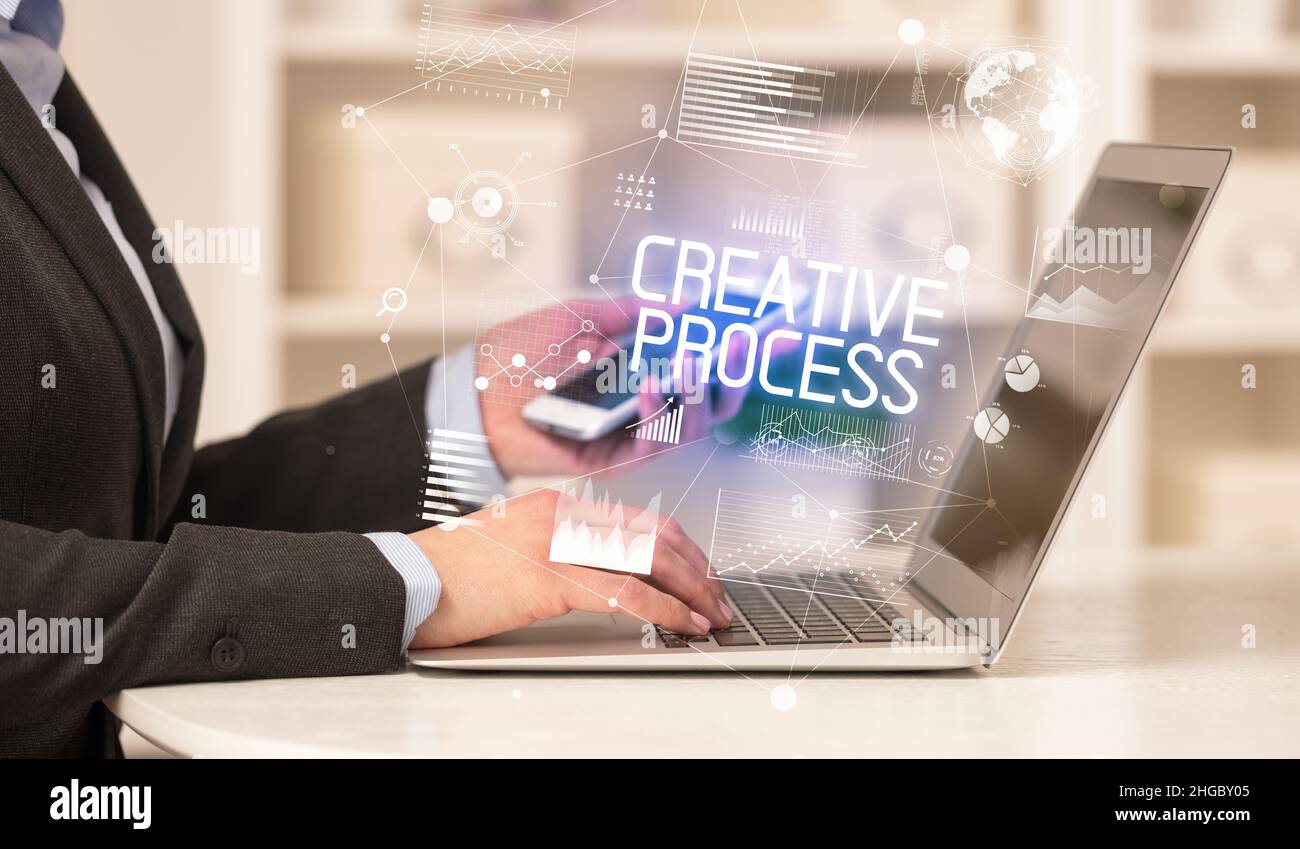 Side view of a business person working on laptop Stock Photo - Alamy