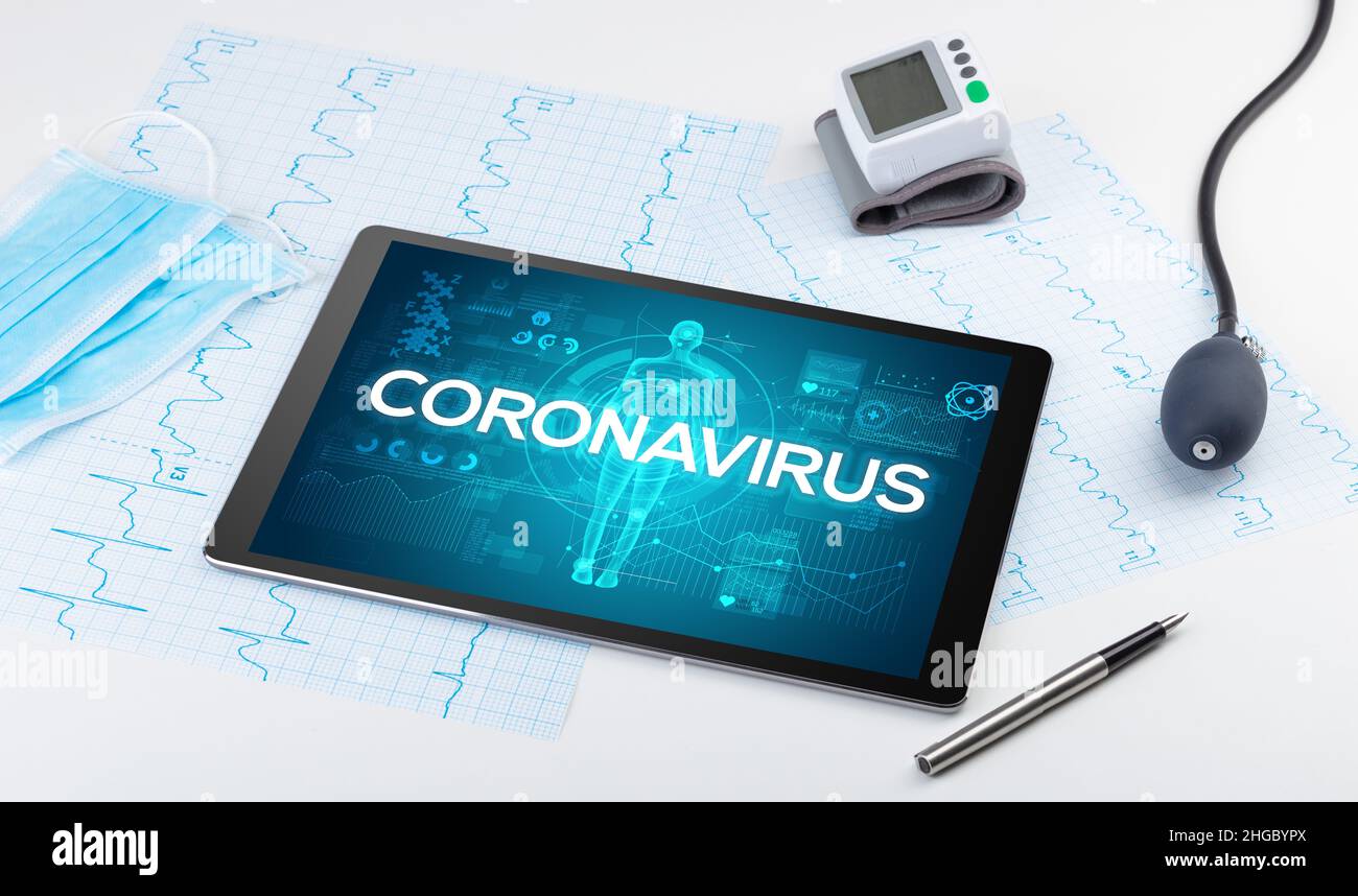 Tablet pc and doctor tools Stock Photo - Alamy