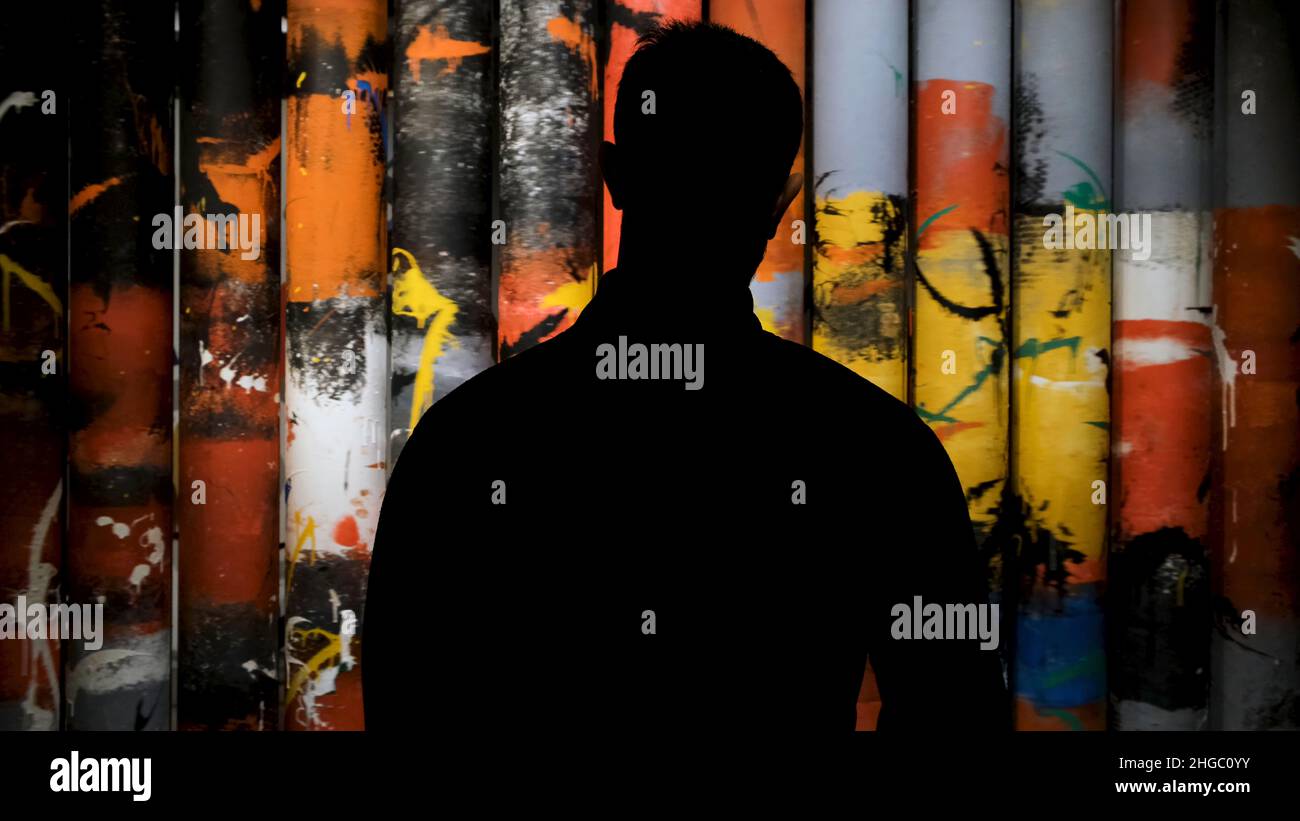 Man looking at art painting in museum, rear view. Male silhouette ...