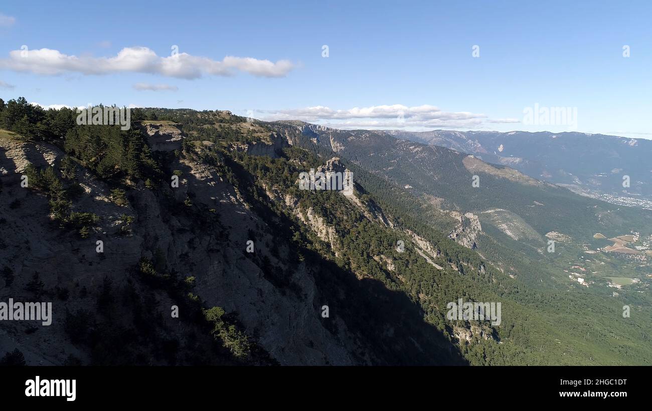 Aerial forest scenery growing on giant mountains. Beautiful summer ...