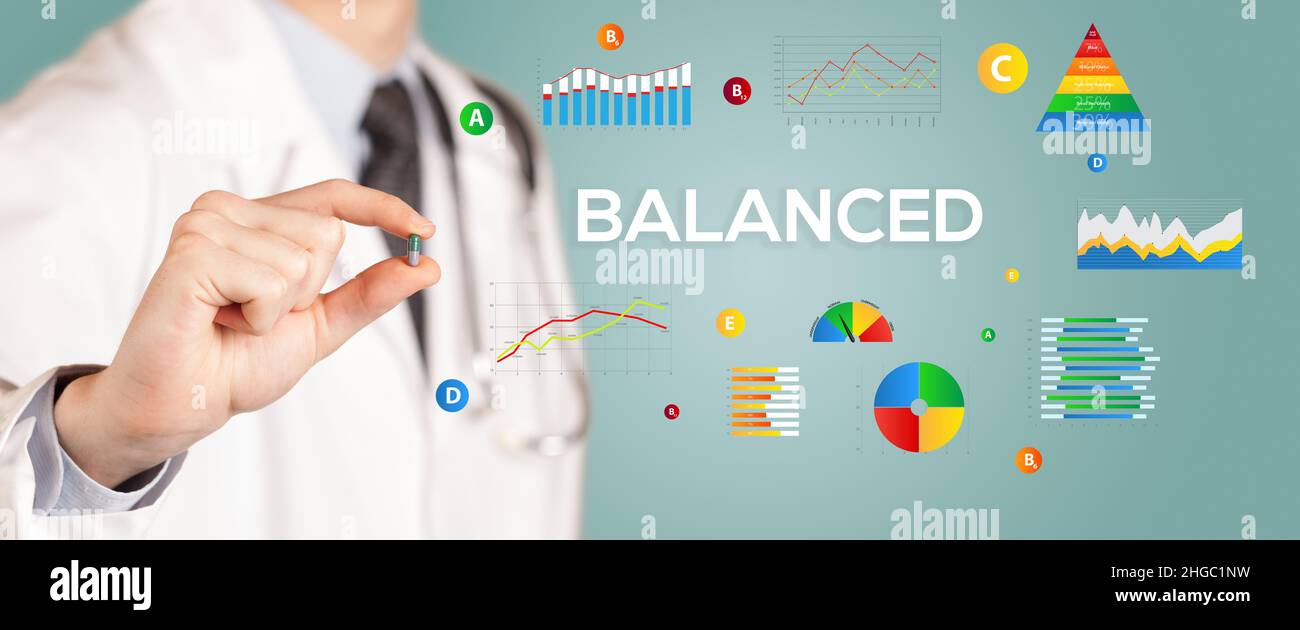 Nutritionist giving you a pill Stock Photo - Alamy