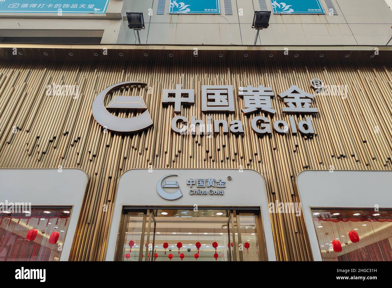 SHANGHAI, CHINA - JANUARY 19, 2022 - Customers choose and buy gold ...