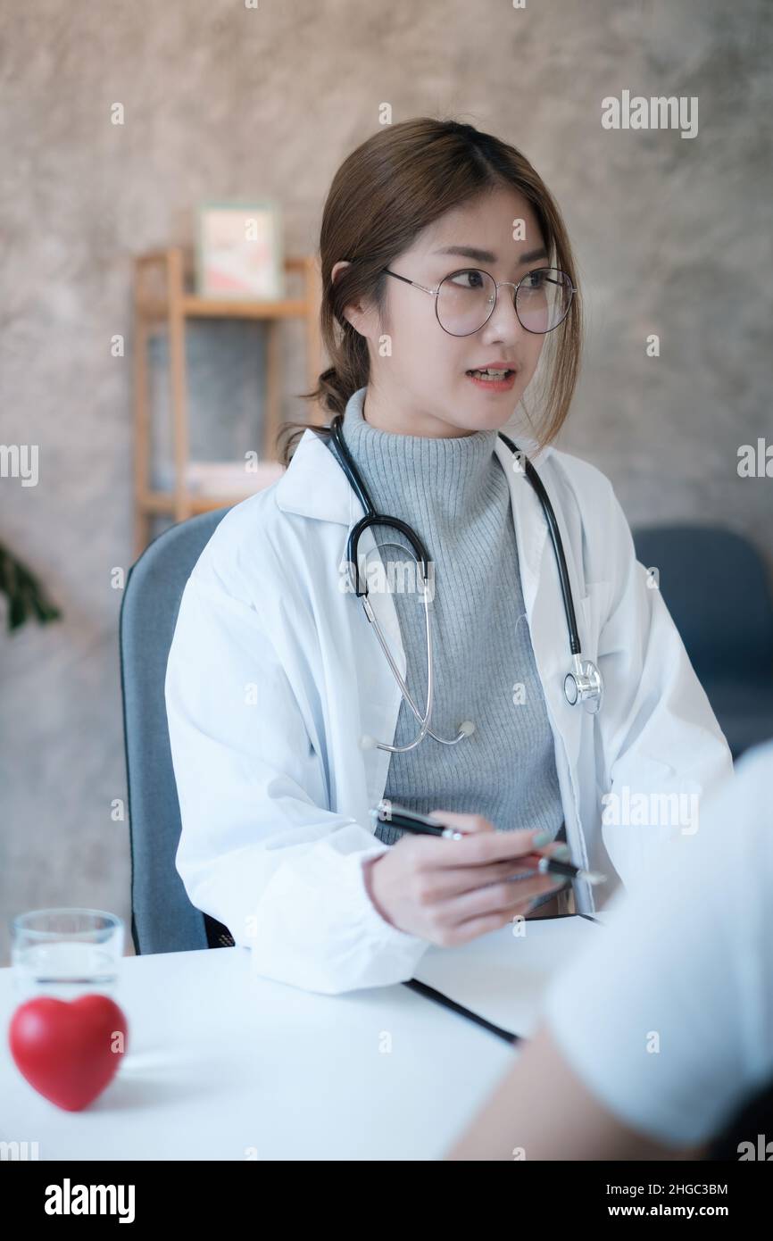 Doctor Discussing And Explain To Patient About Life Plan Medicine And