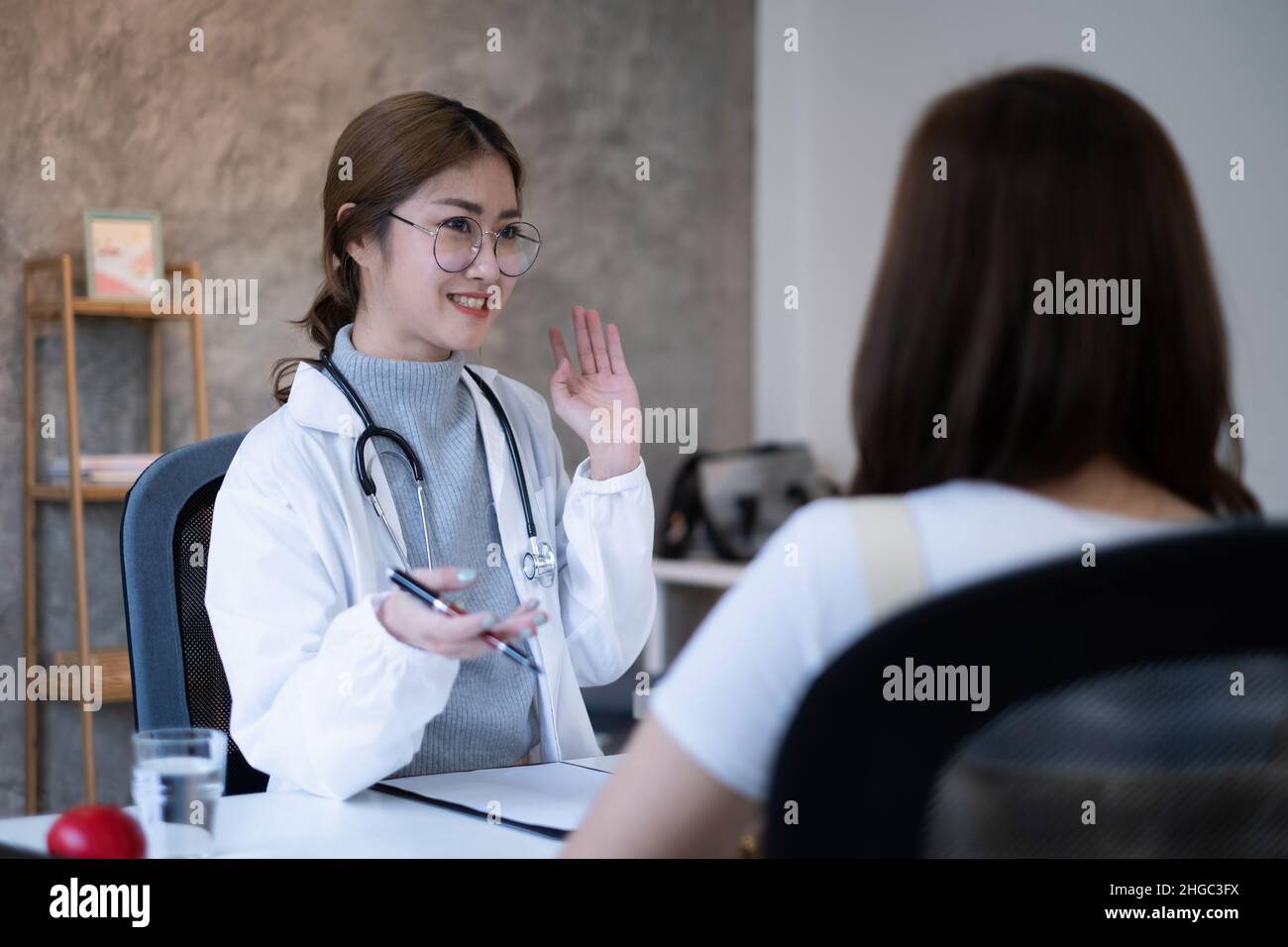 Doctor discussing and explain to patient about life plan. Medicine and ...