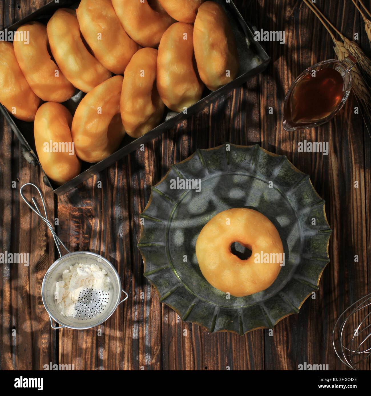Classic Donuts with Sugar Dusting for Breakfast on Wooden Table, Top ...